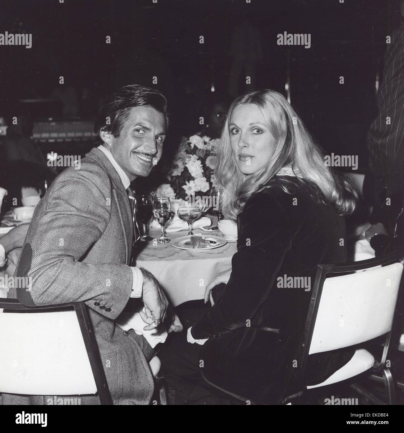 GEORGE HAMILTON with wife.Supplied by Photos, inc. © Supplied By Globe ...