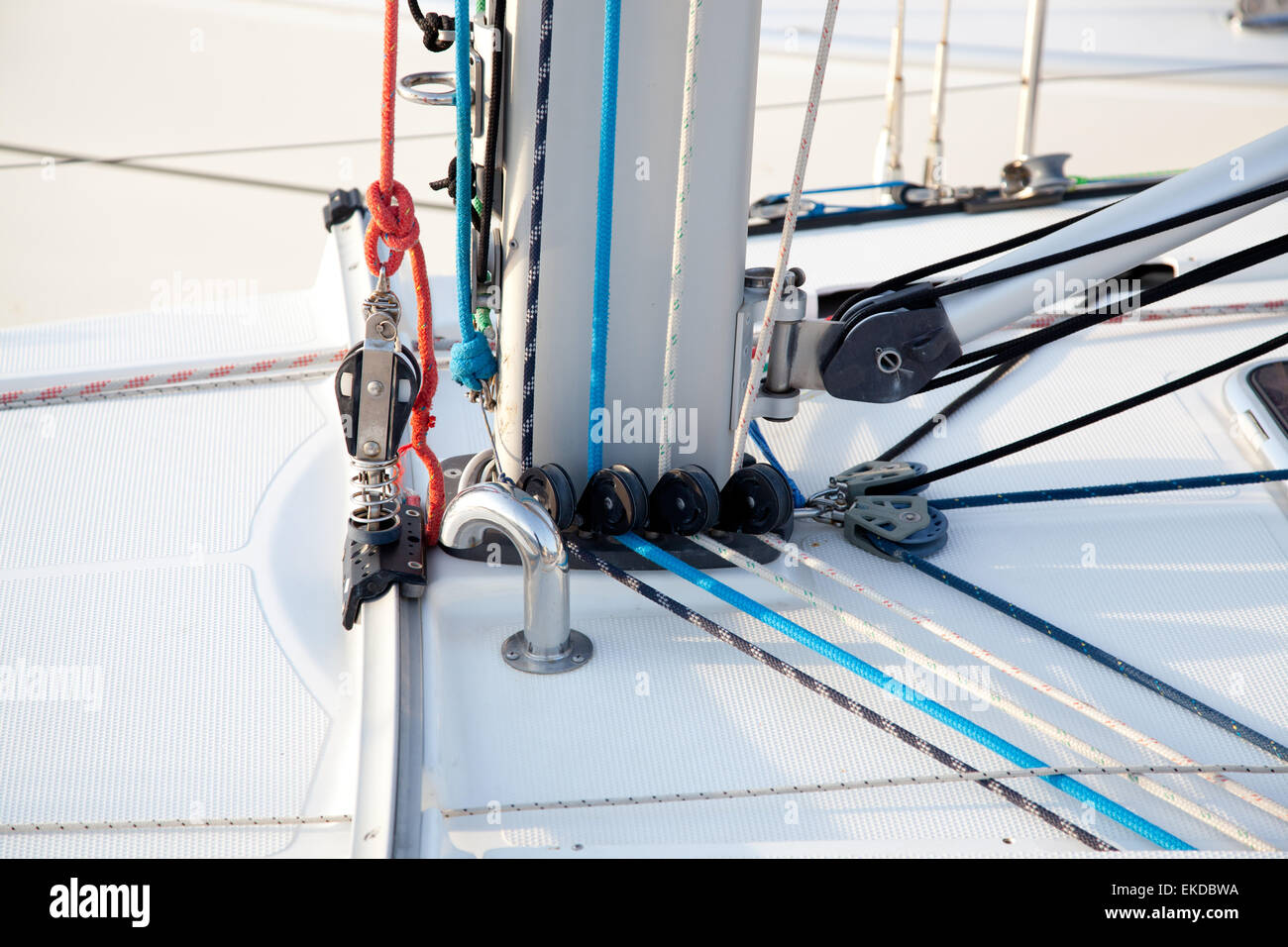 Detail of sailboat mast bottom with ropes Stock Photo - Alamy