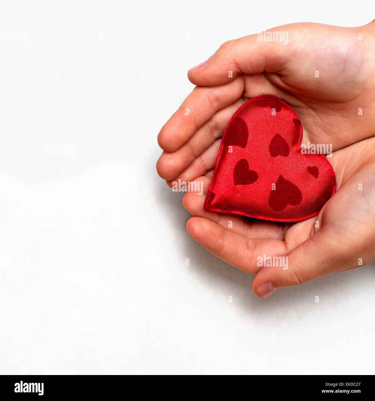 One heart with two hands hi-res stock photography and images - Alamy