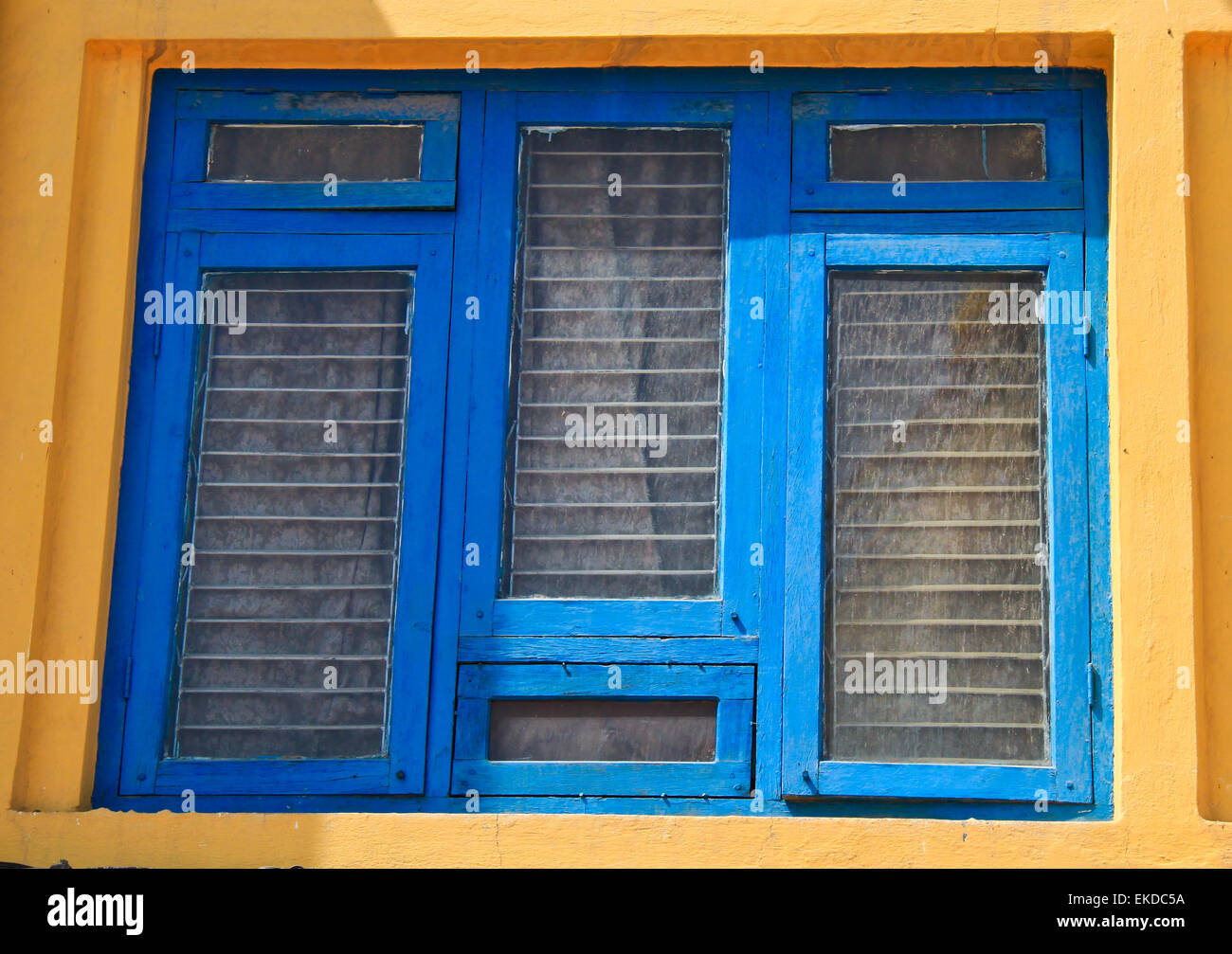 Yellow and blue wall texture hi-res stock photography and images - Alamy