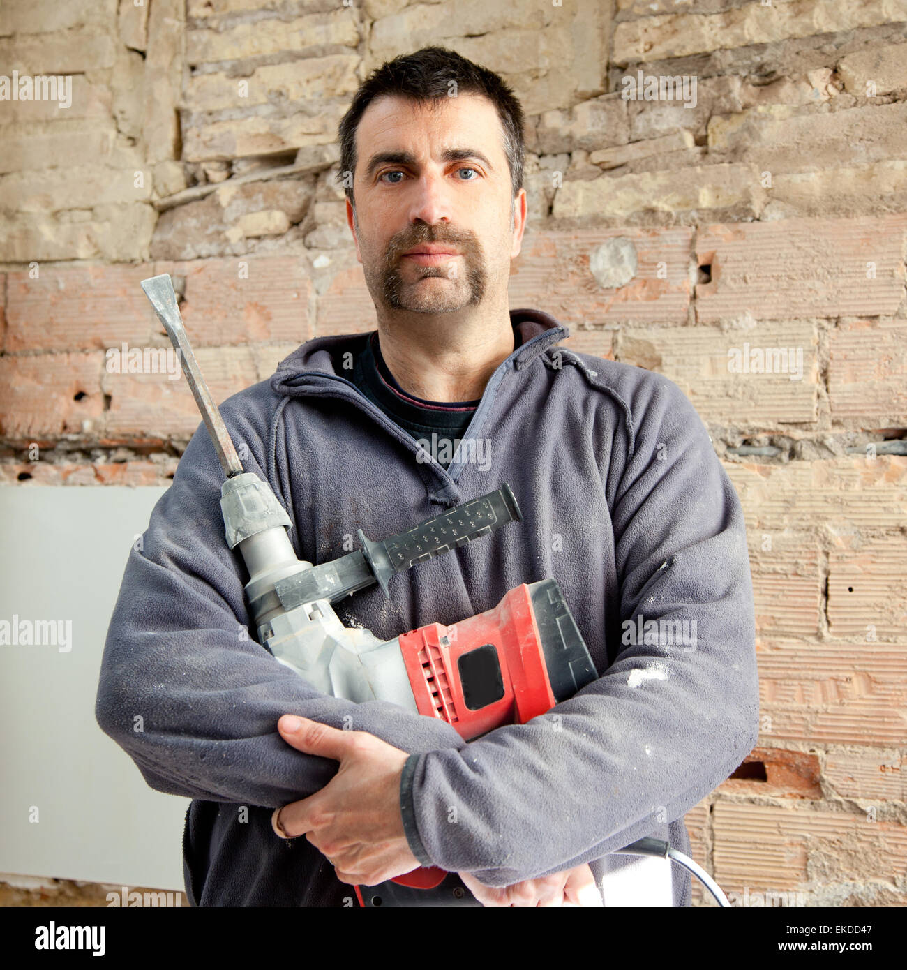 demolition hammer man mason manual worker Stock Photo - Alamy