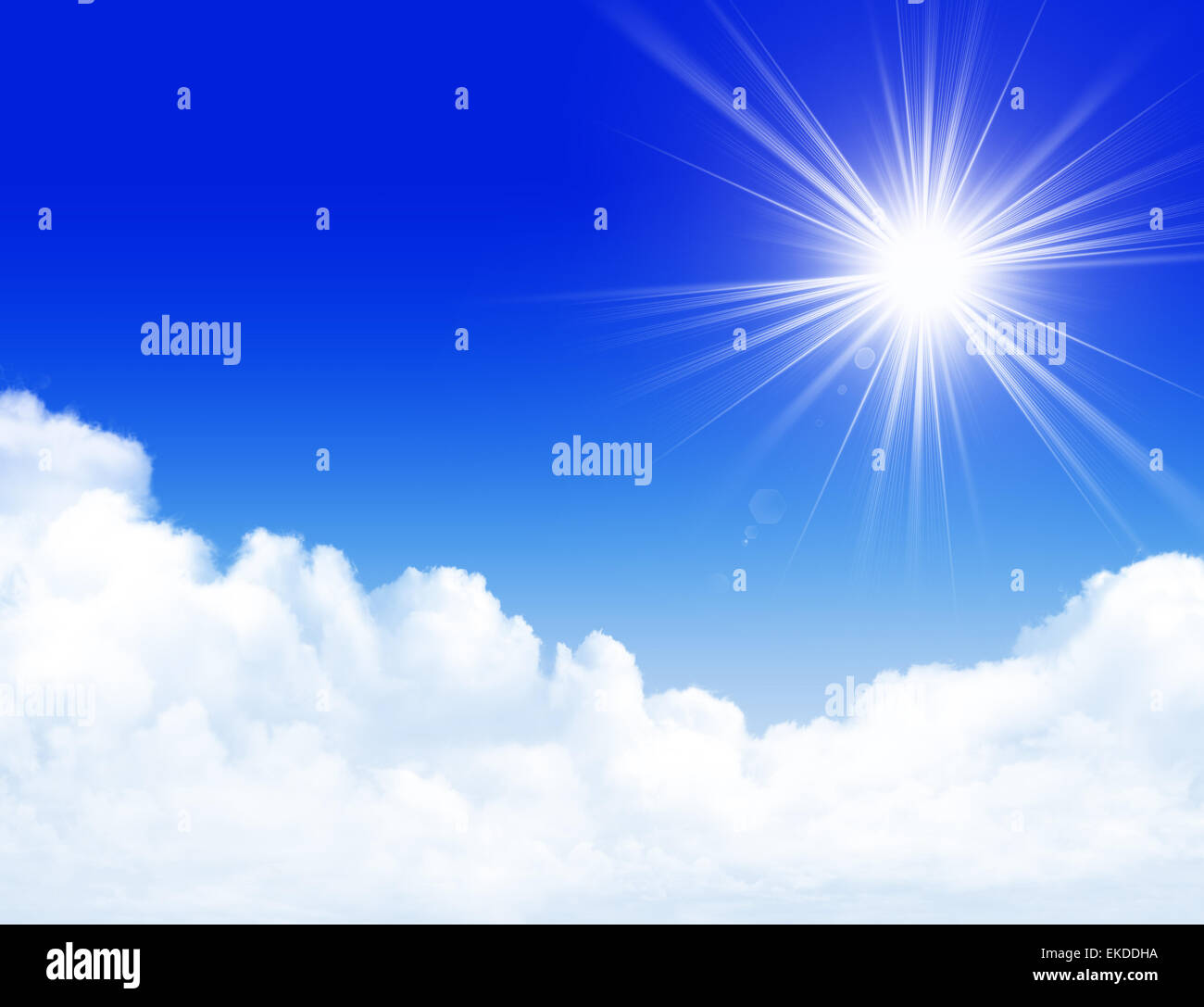 Sun in bright blue sky Stock Photo - Alamy
