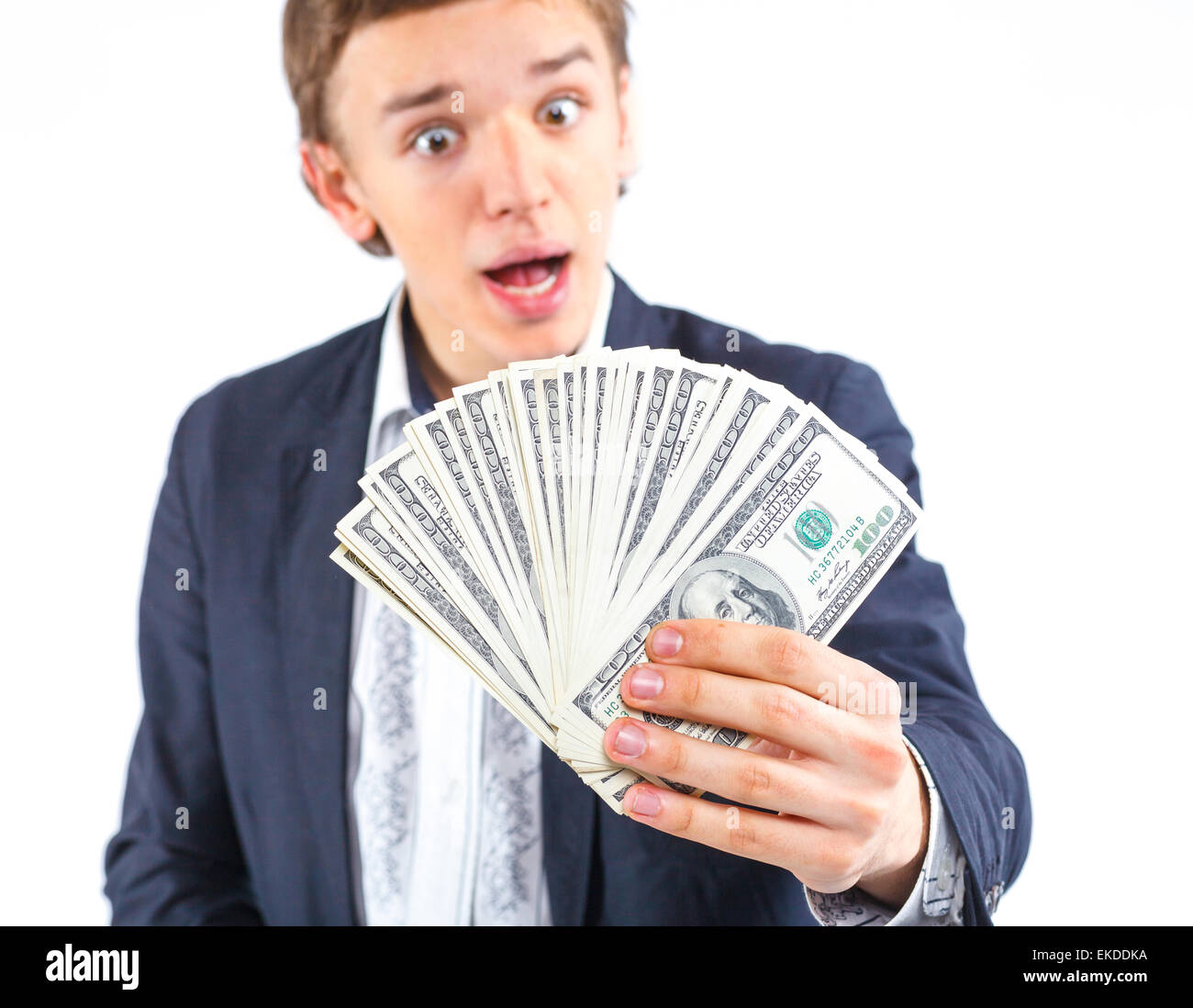 Young man with money Stock Photo - Alamy