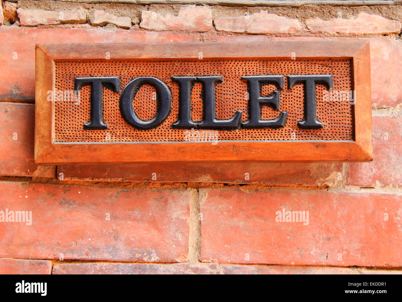 Ancient toilet sign on brick wall Stock Photo - Alamy