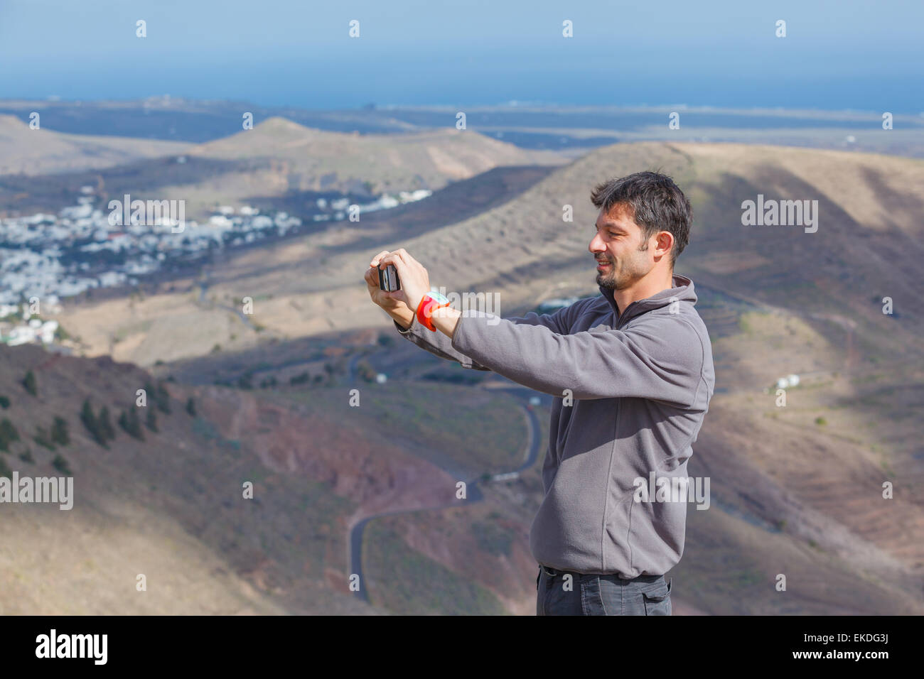 Man photographing view Stock Photo - Alamy