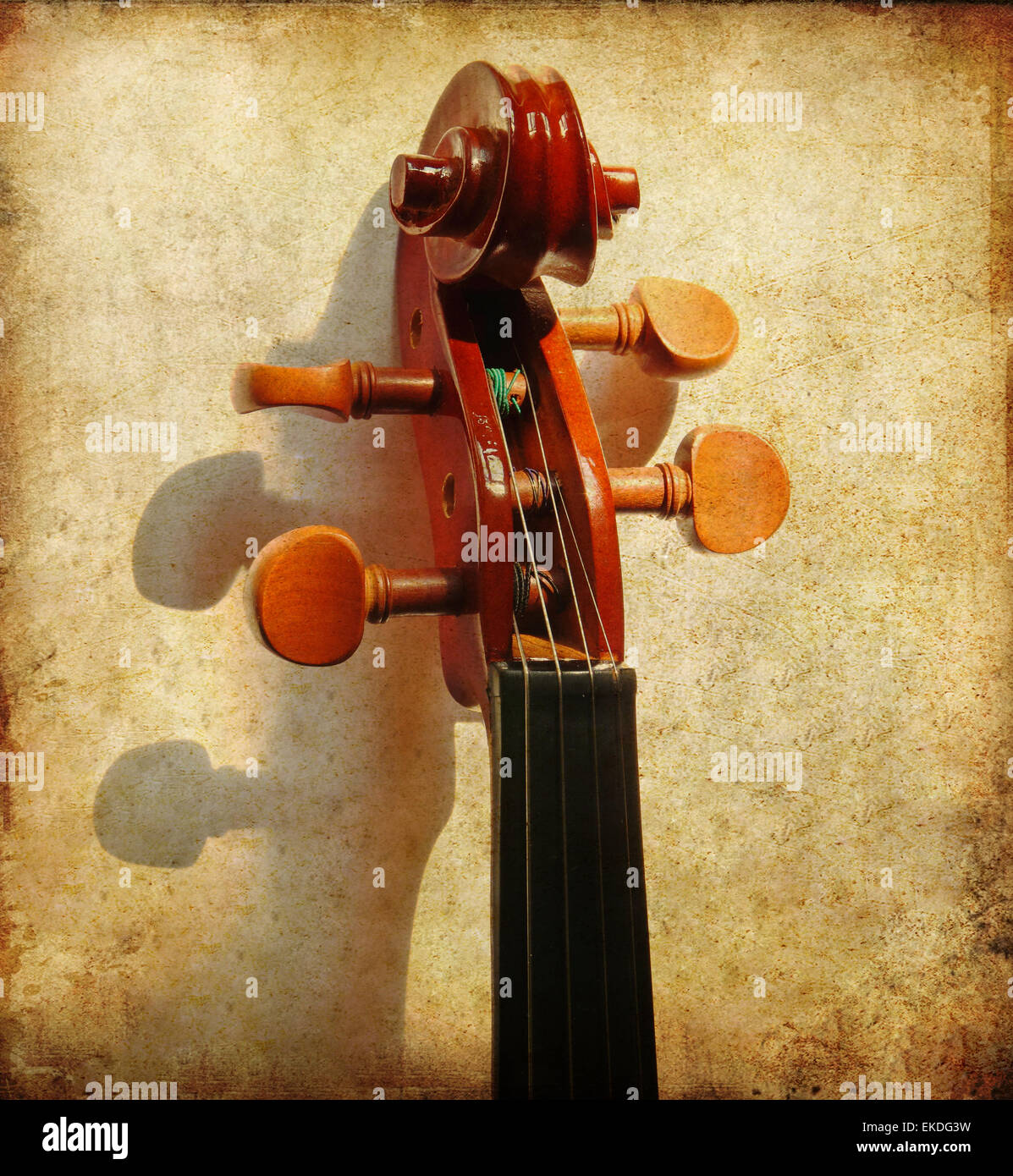 Details of violin head on grunge background Stock Photo - Alamy