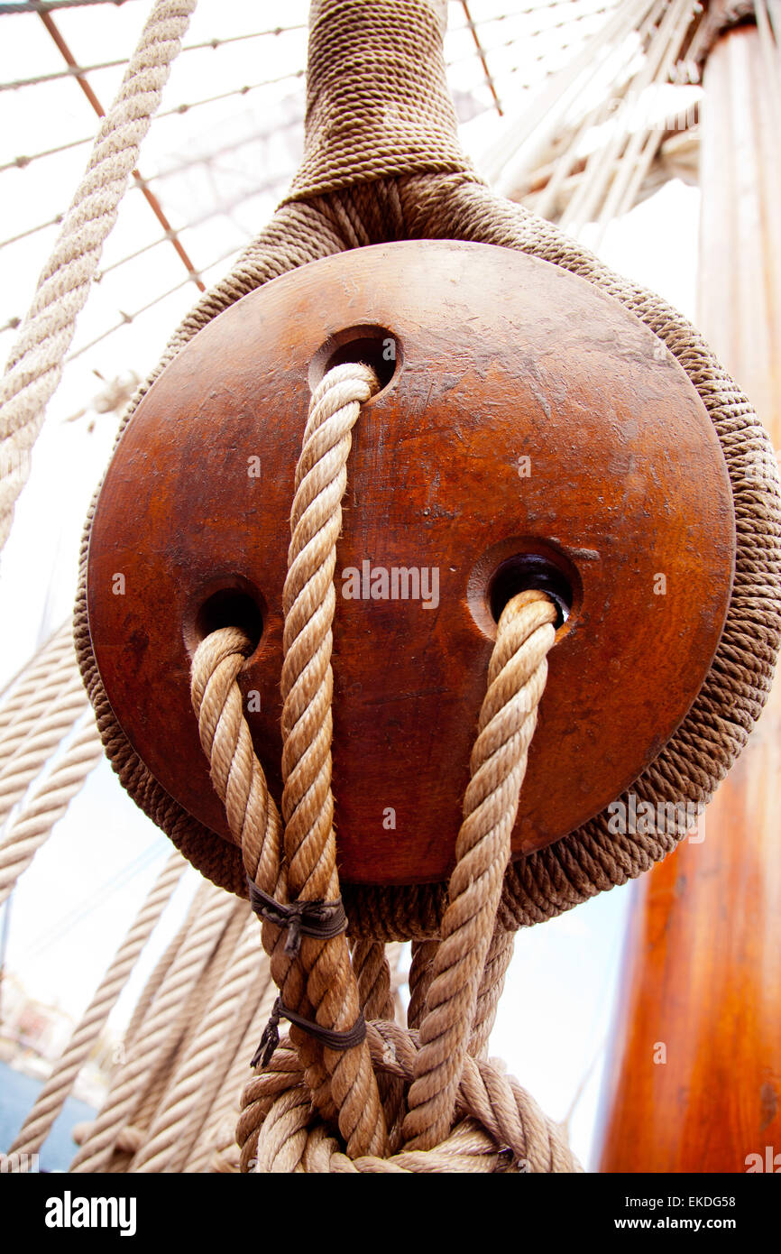 Ancient wooden sailboat pulleys and ropes Stock Photo - Alamy