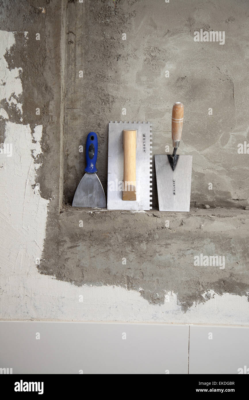 construction stainless steel trowel tools and spatula Stock Photo - Alamy