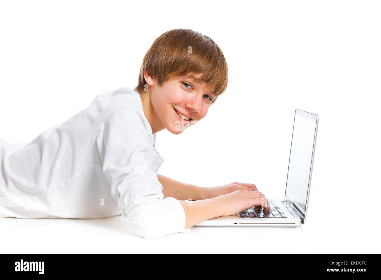 Boy using a laptop Stock Photo - Alamy