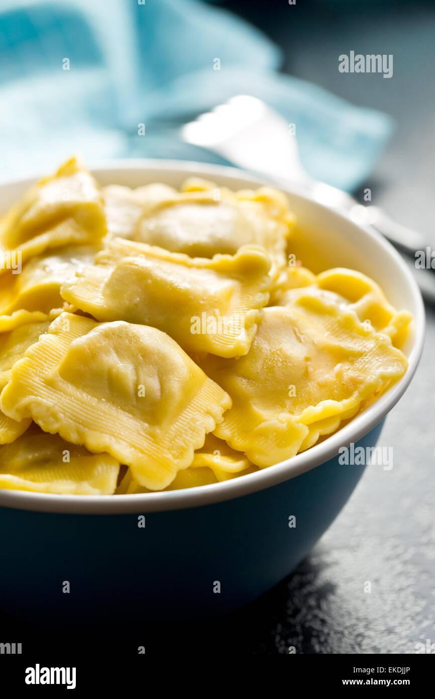 cooked ravioli in bowl on kitchen table Stock Photo - Alamy