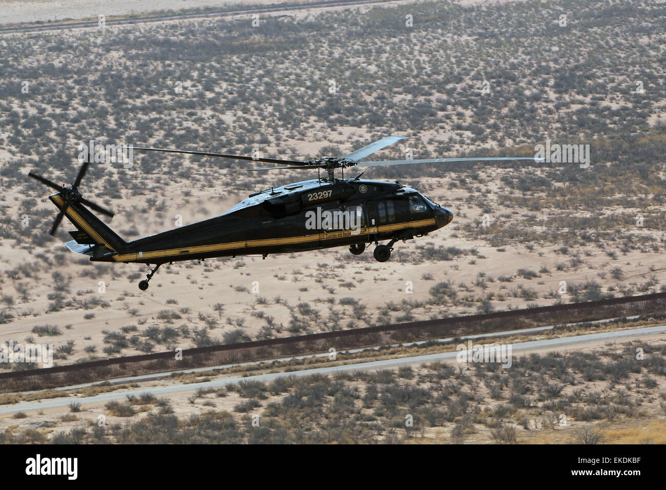 A CBP Black Hawk helicopter conducts aerial patrol along the border ...