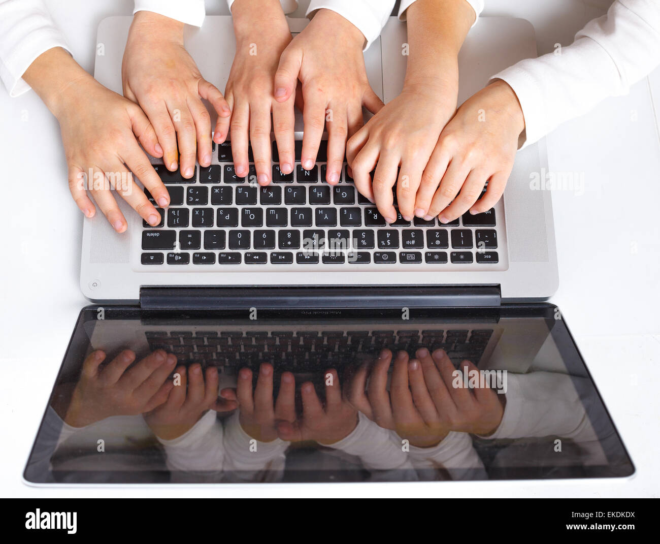 Hands on keypad Stock Photo - Alamy