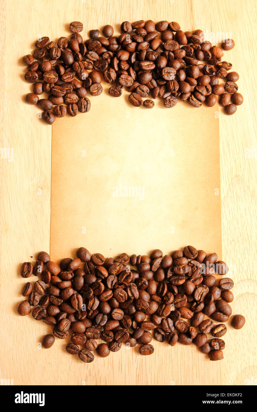 Coffee beans with old paper for notes on the wooden background Stock ...
