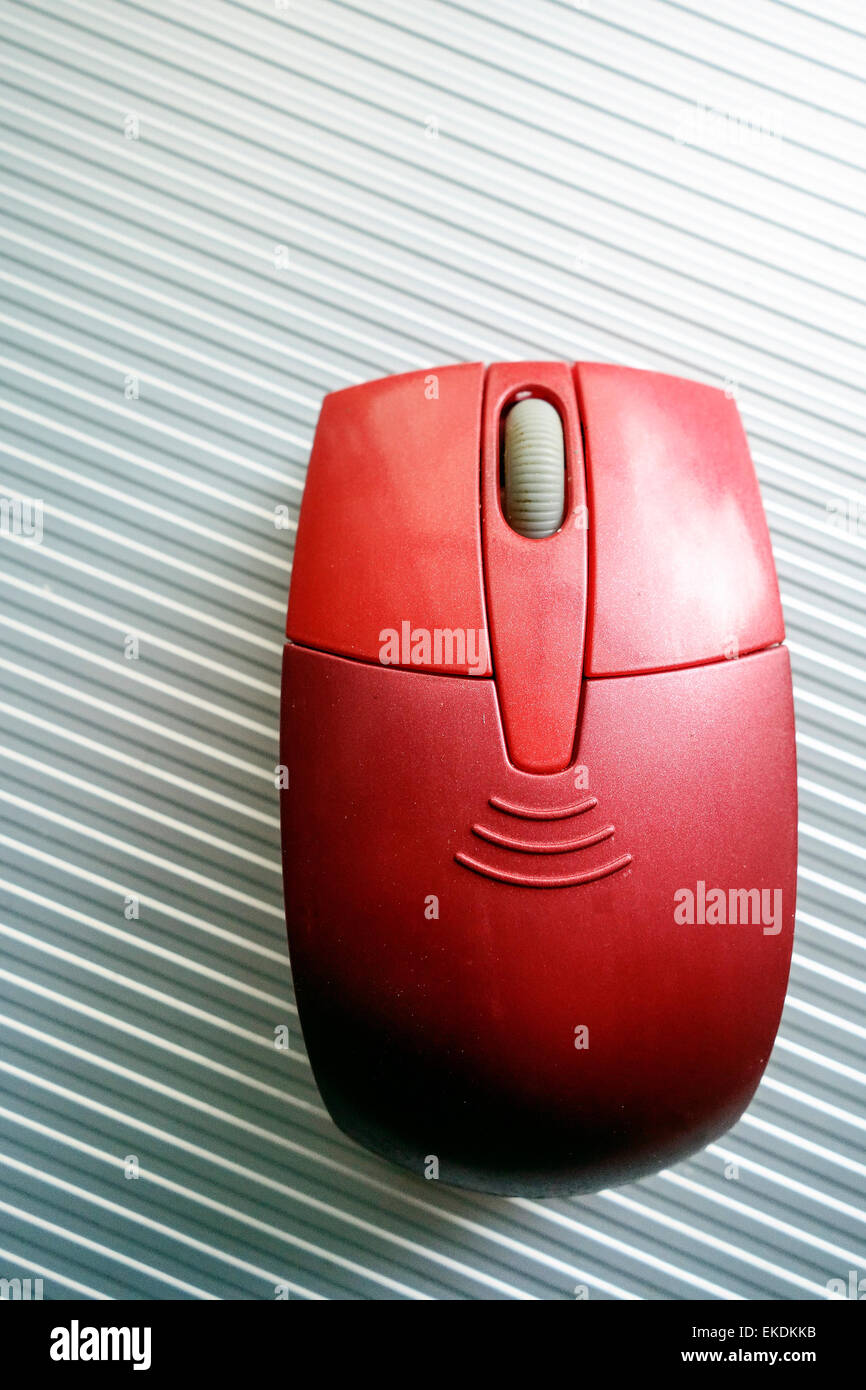 Red Cordless Computer Mouse Stock Photo - Alamy