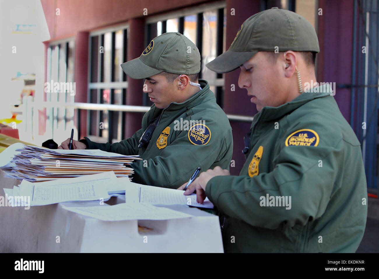 CBP Border Patrol agents complete paperwork after securing a bus at the ...