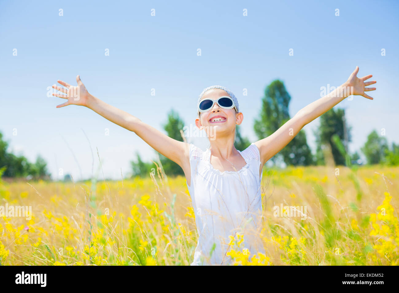 Girl in field Stock Photo - Alamy