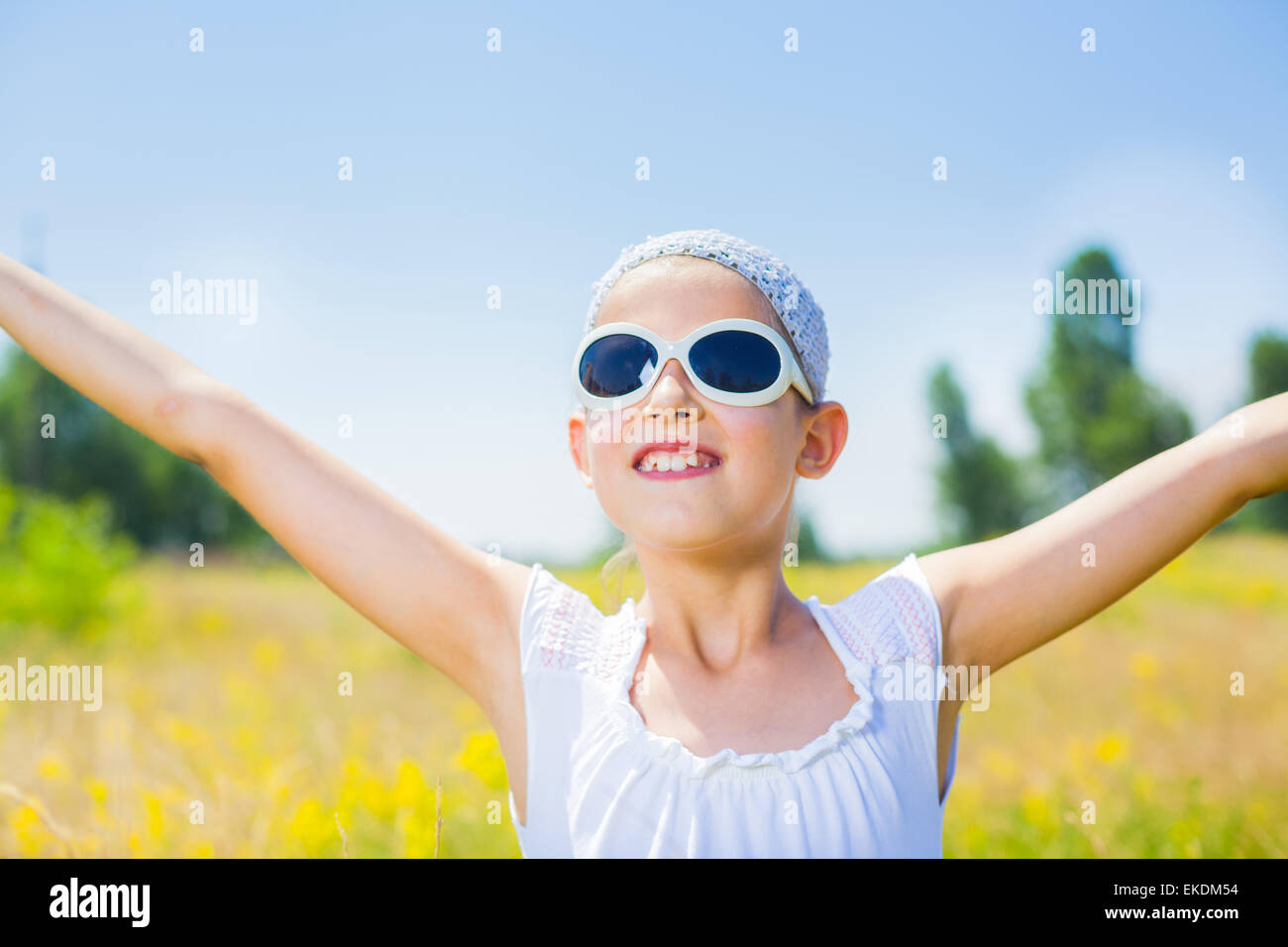 Girl in field Stock Photo - Alamy