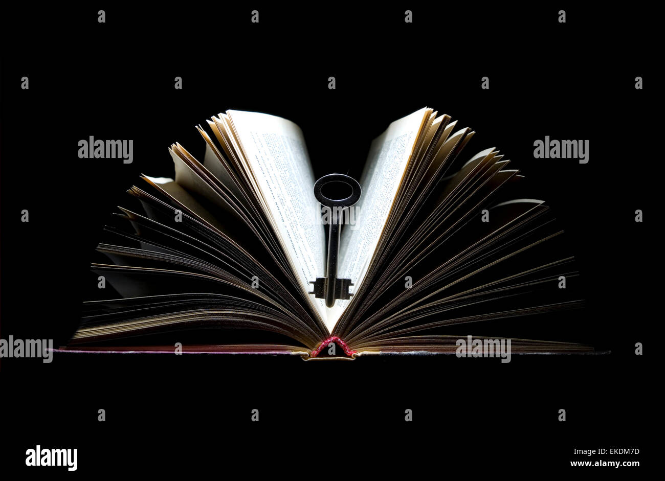 Key and book Stock Photo - Alamy