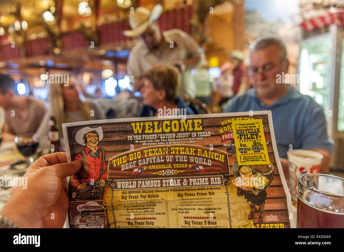 Ordering from the menu at the Big Texan Steak Ranch. Amarillo. Texas ...