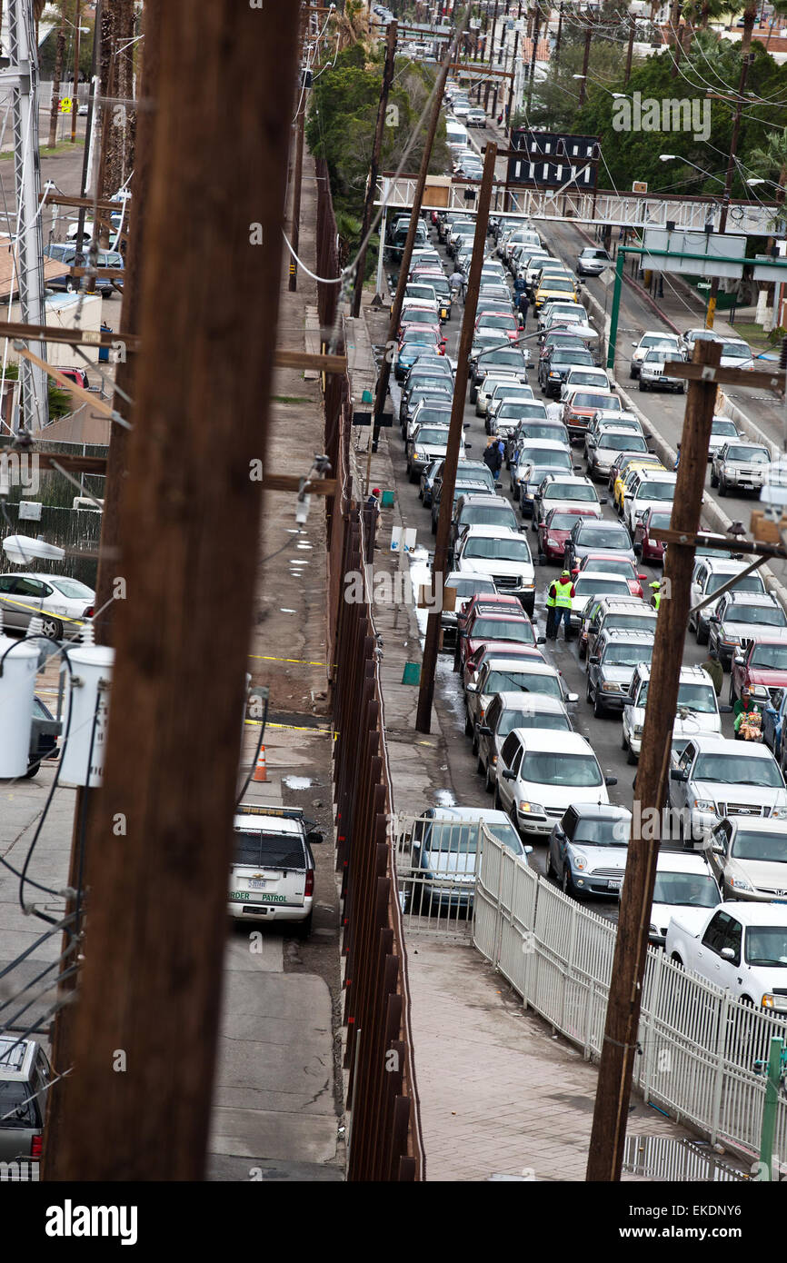 Traffic along the border fence at the Calexico Port of Entry is shown ...