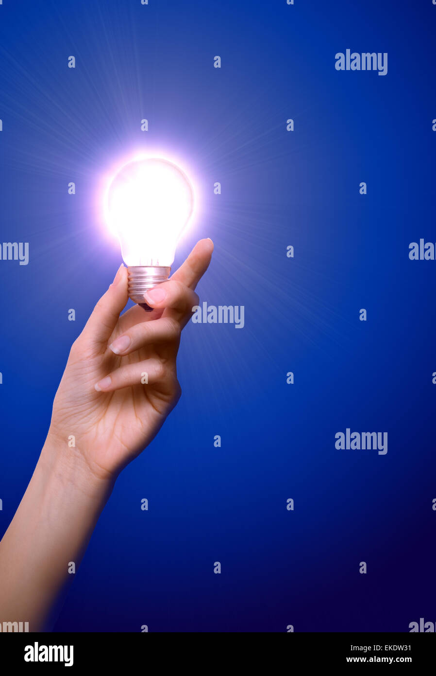 lamp in the woman's hand as a symbol of light Stock Photo - Alamy