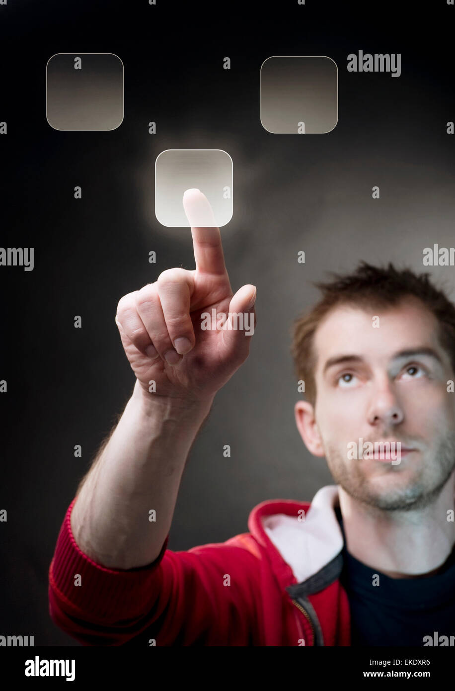 Young Man Pushing The Button Stock Photo - Alamy