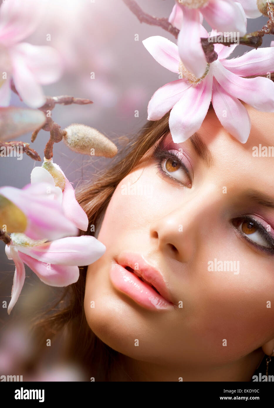Beautiful Girl's face with flowers Stock Photo - Alamy