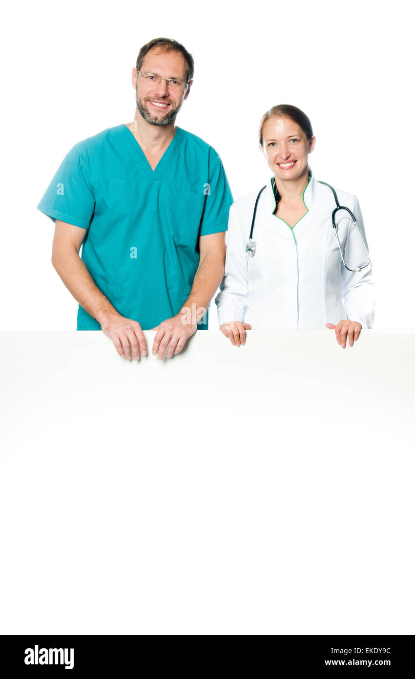 doctors holding blank board Stock Photo - Alamy