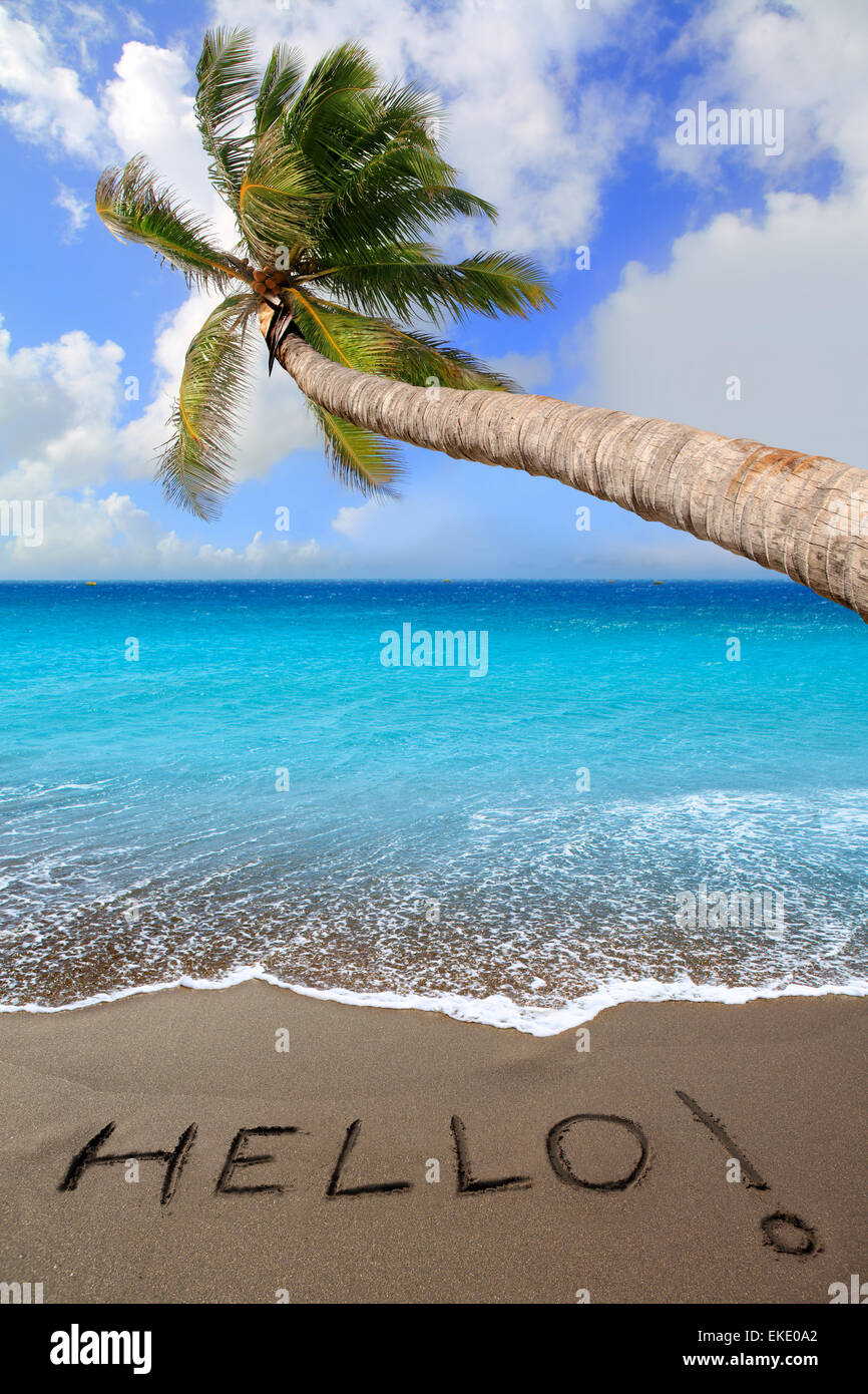 Brown sand beach with written word Hello Stock Photo - Alamy