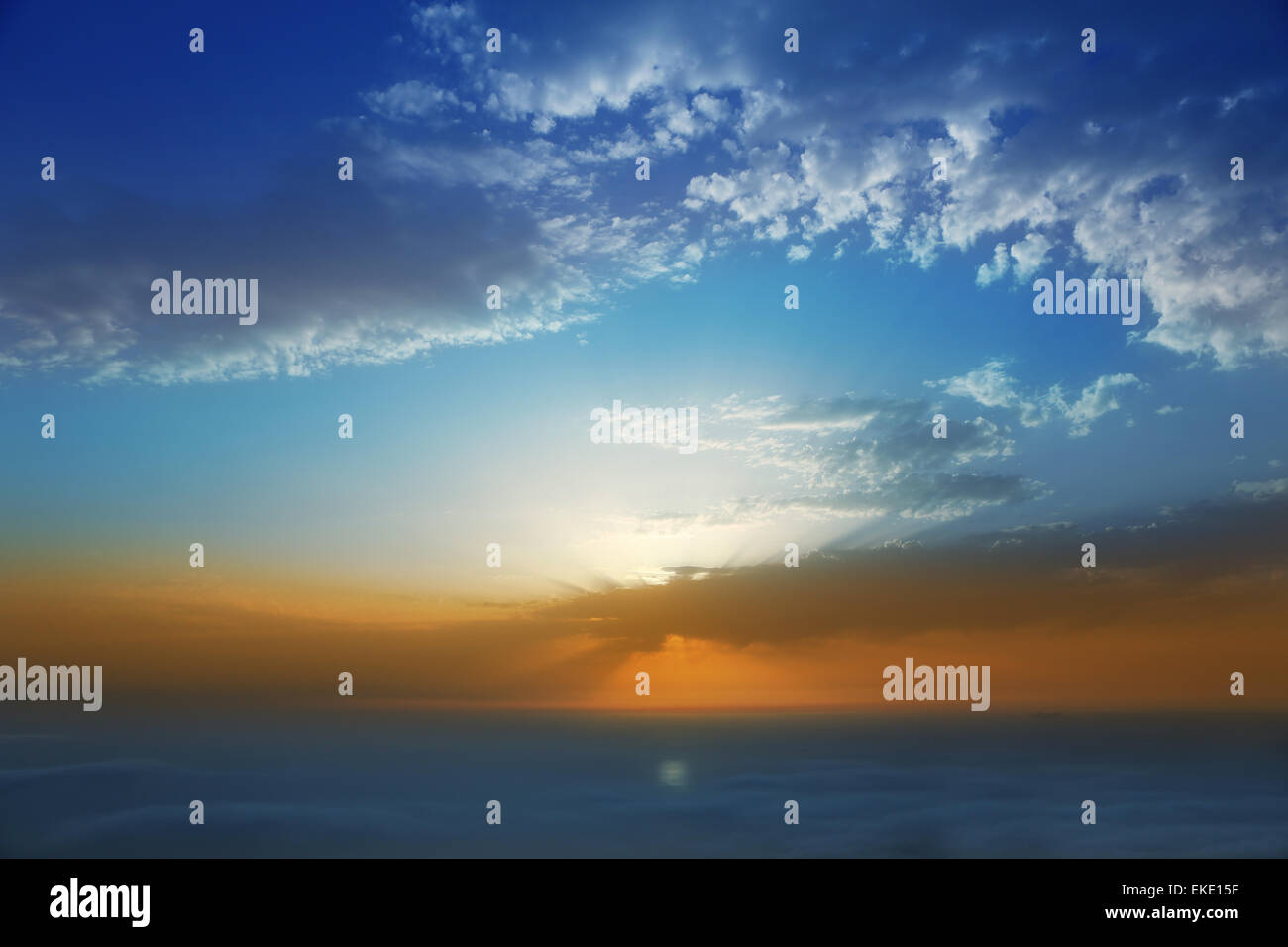 Sunset sky over haze sea of clouds Stock Photo - Alamy