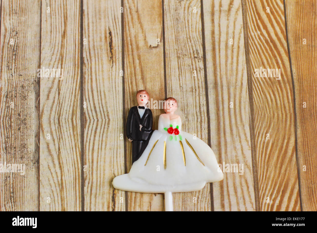 wedding bride and groom couple doll on wood background Stock Photo - Alamy