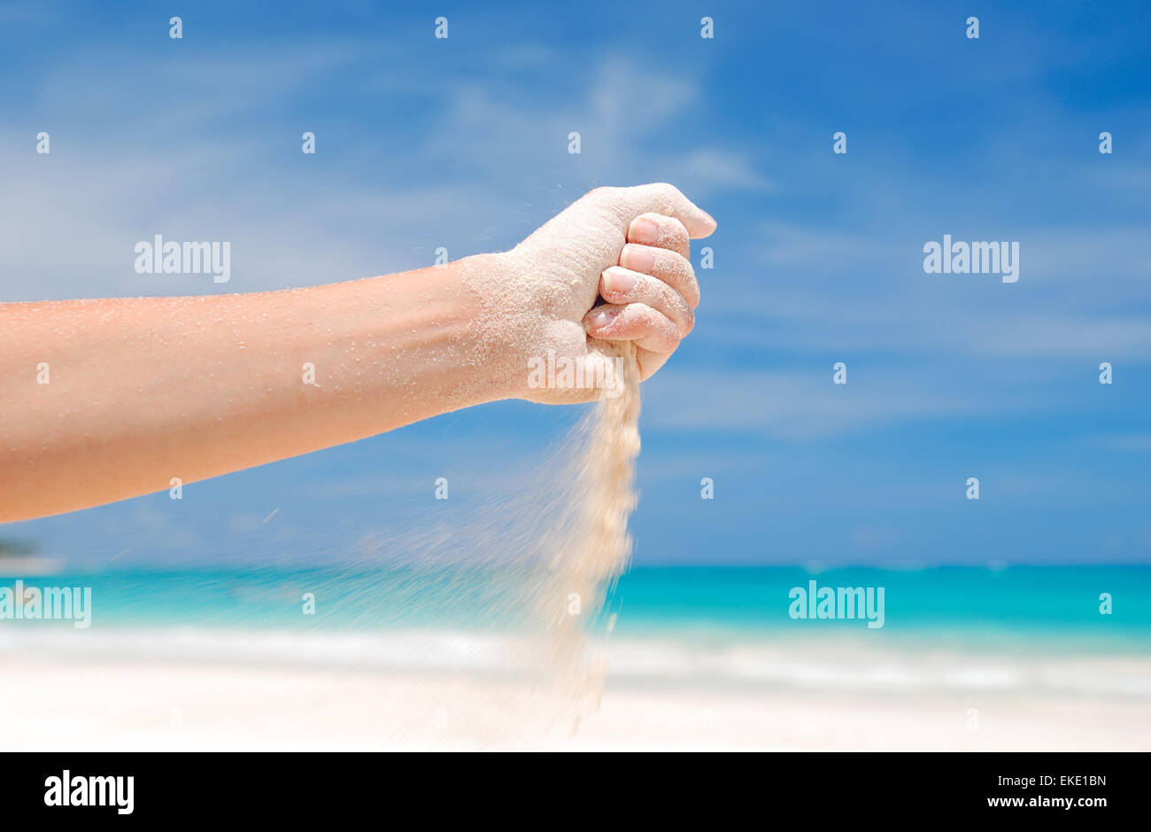 Sand in hand Stock Photo - Alamy