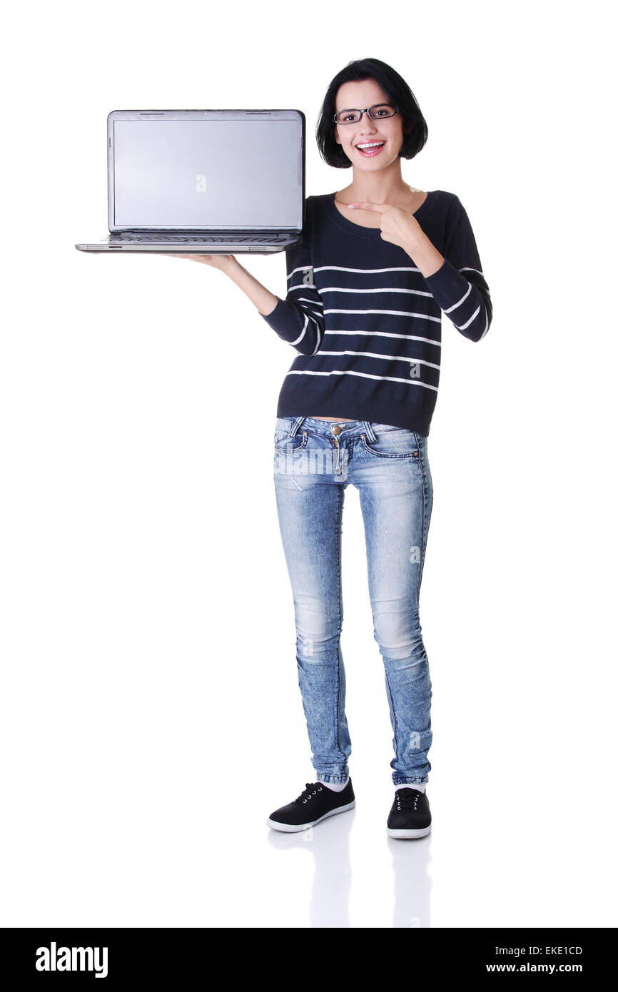 Young woman holding and showing screen of 17 inch laptop Stock Photo ...
