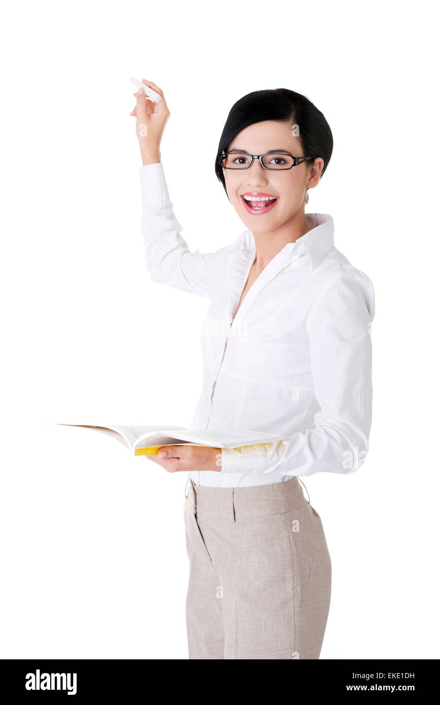 Teacher with book and chalk Stock Photo - Alamy