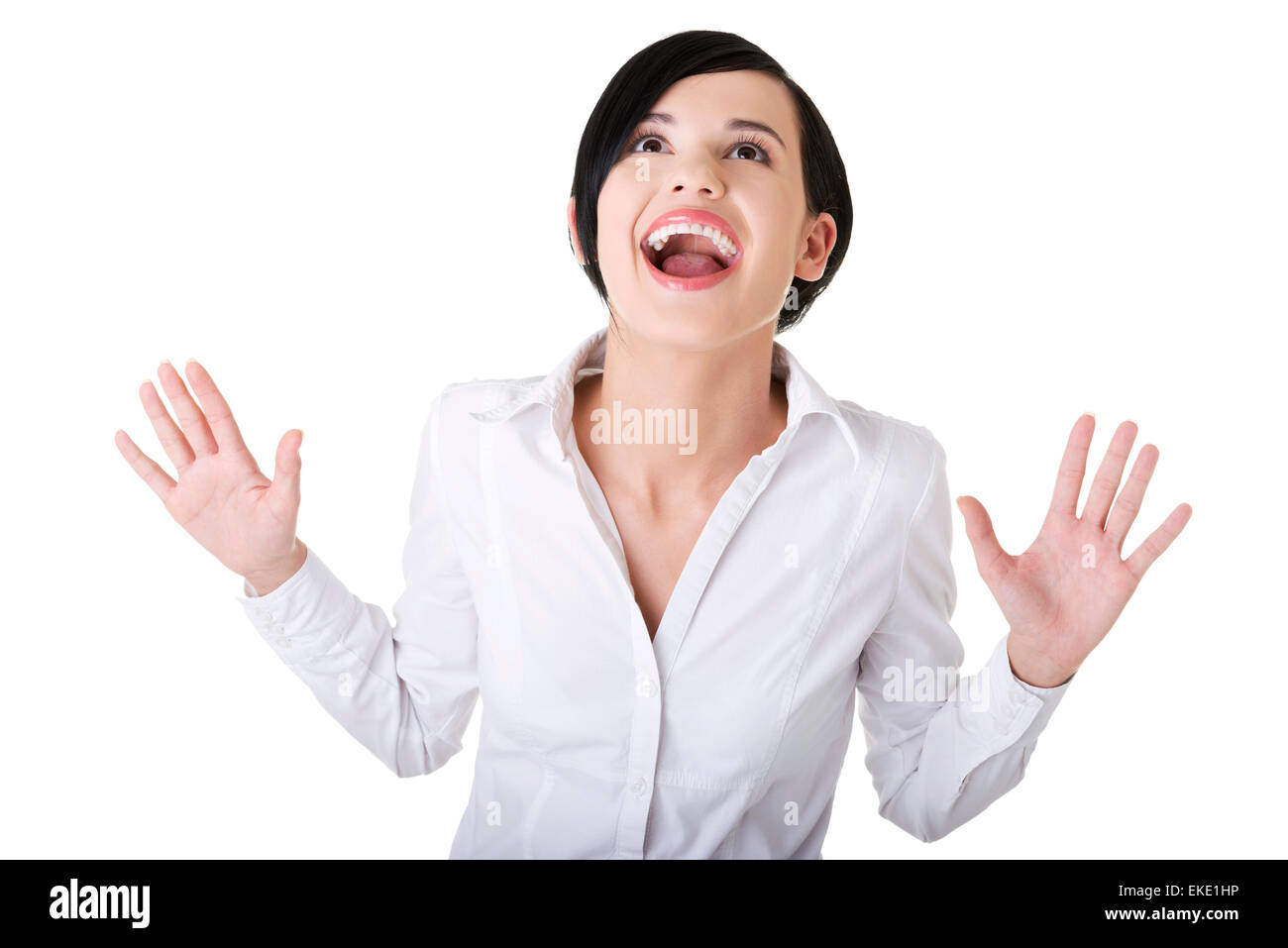Portrait of surprised excited young business woman looking up Stock ...