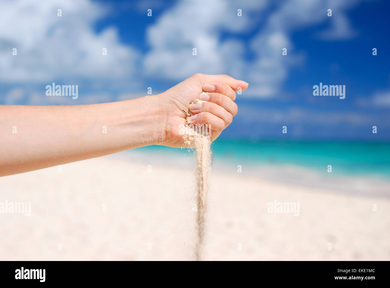 Sand in hand Stock Photo - Alamy
