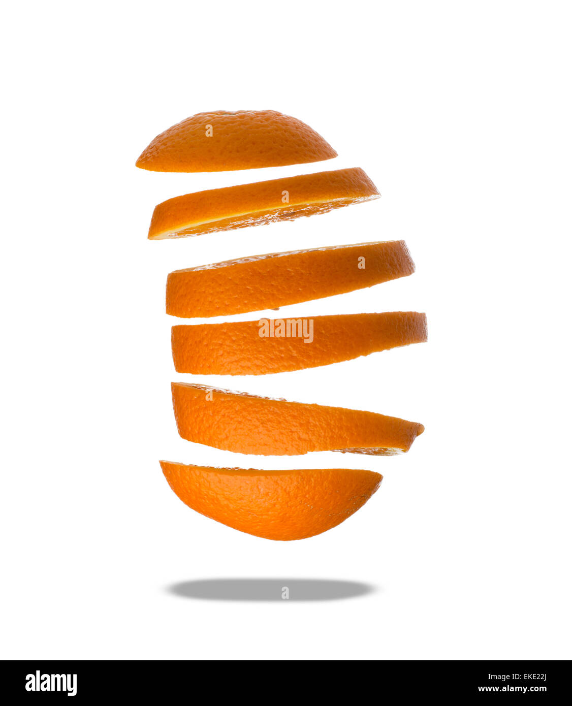 Falling slices of orange in air isolated on white Stock Photo - Alamy