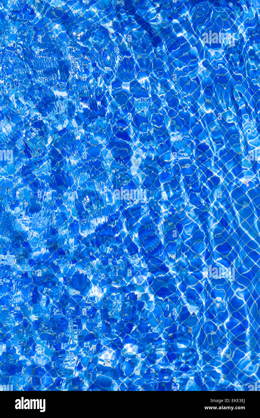 Blue tiels pool with ripple water reflection Stock Photo - Alamy
