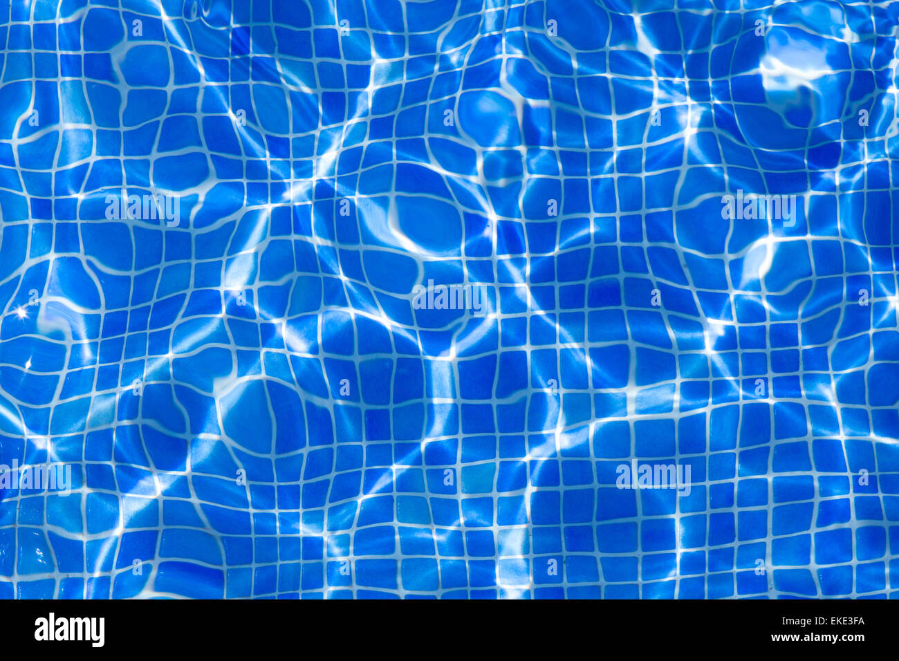 Blue tiels pool with ripple water reflection Stock Photo - Alamy