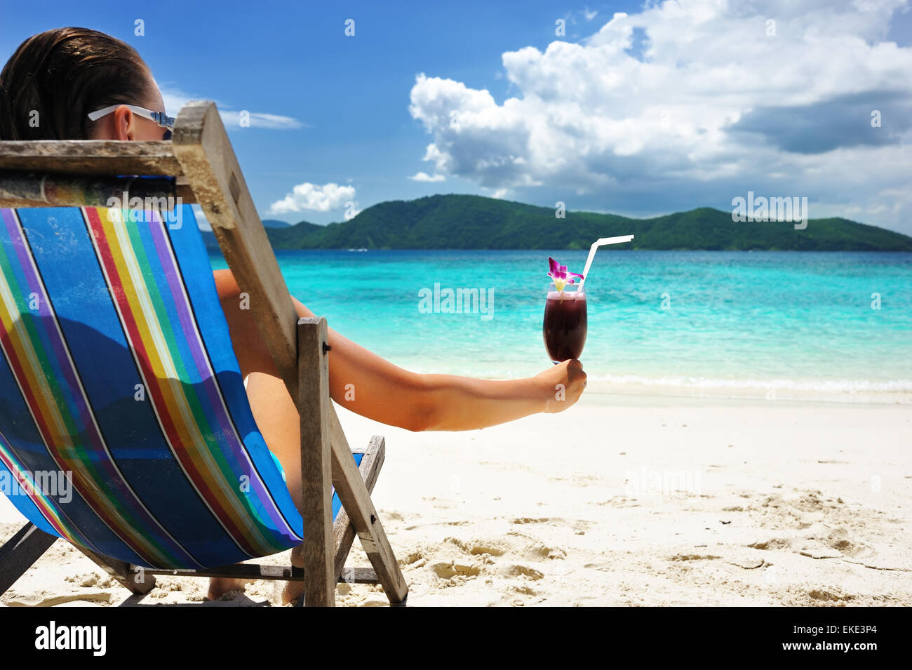 Girl with tropical cocktail Stock Photo - Alamy
