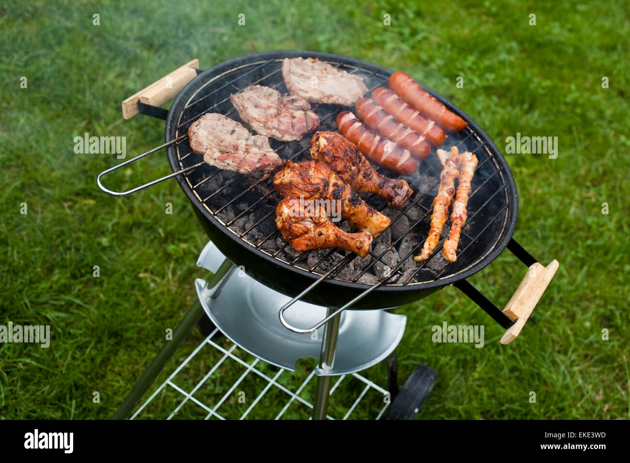 Barbecue a hot summer evening, Grilling Stock Photo - Alamy