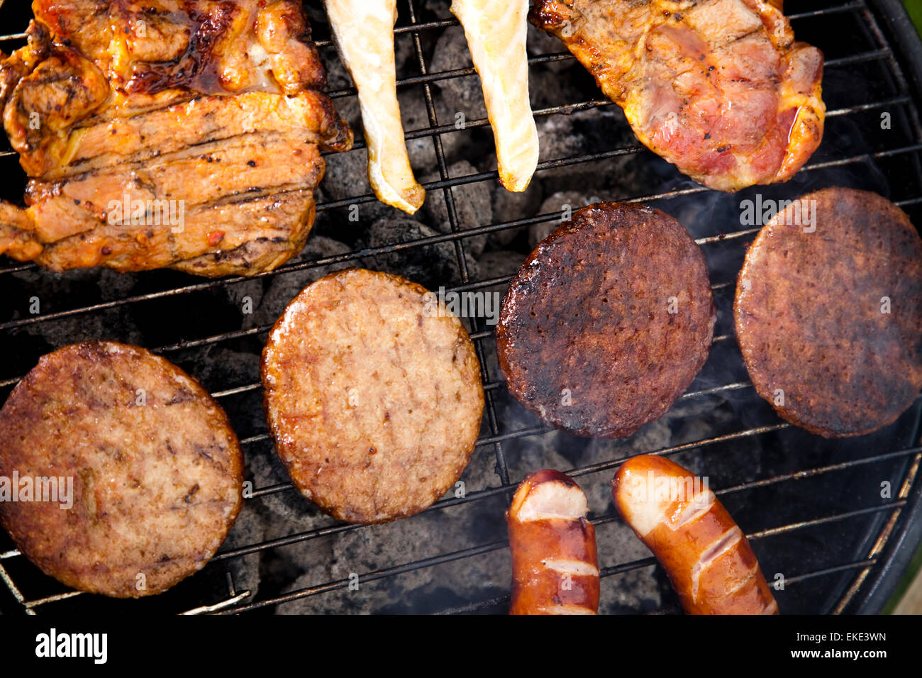 Barbecue a hot summer evening, Grilling Stock Photo - Alamy