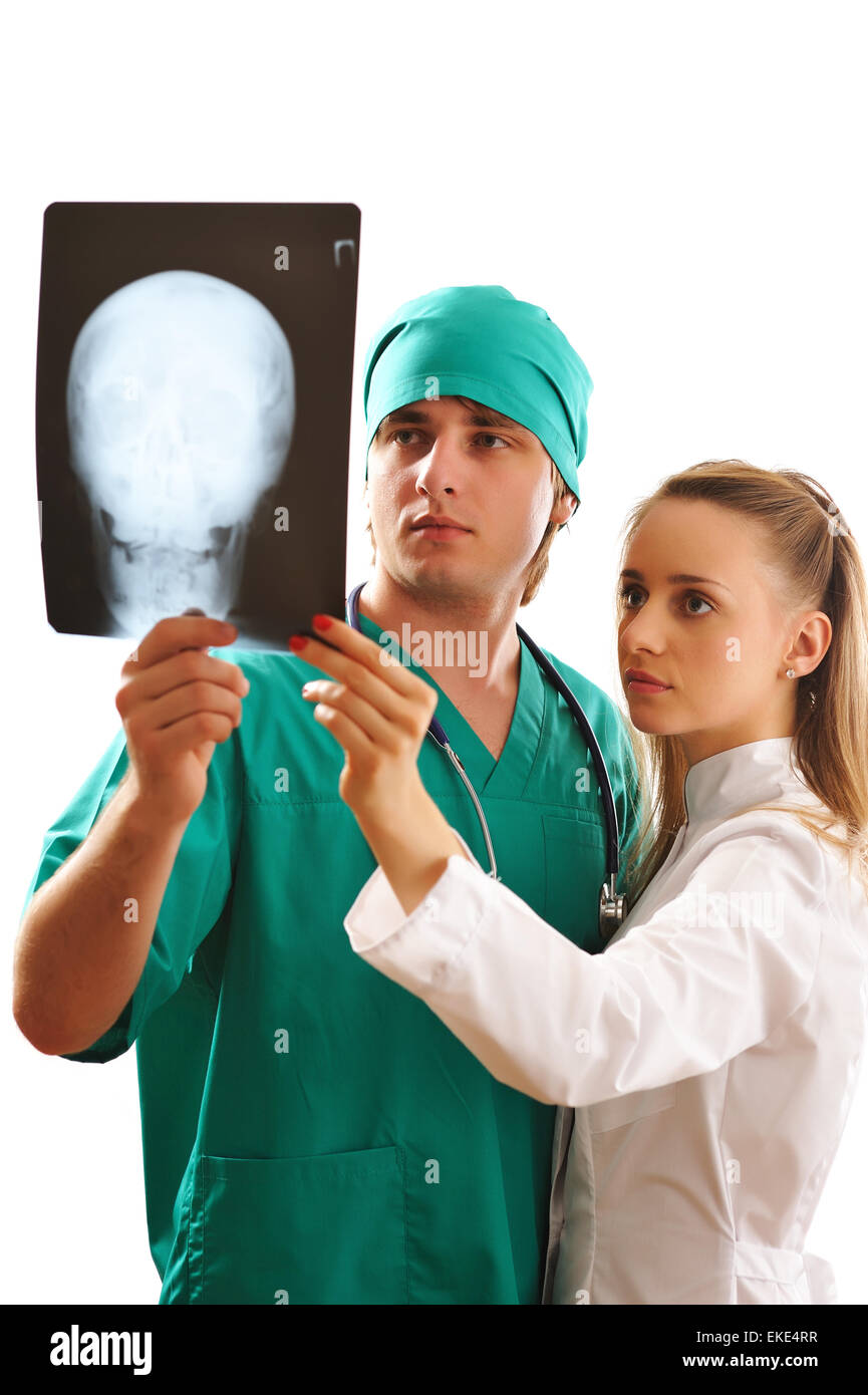 Doctors looking at x-ray Stock Photo - Alamy