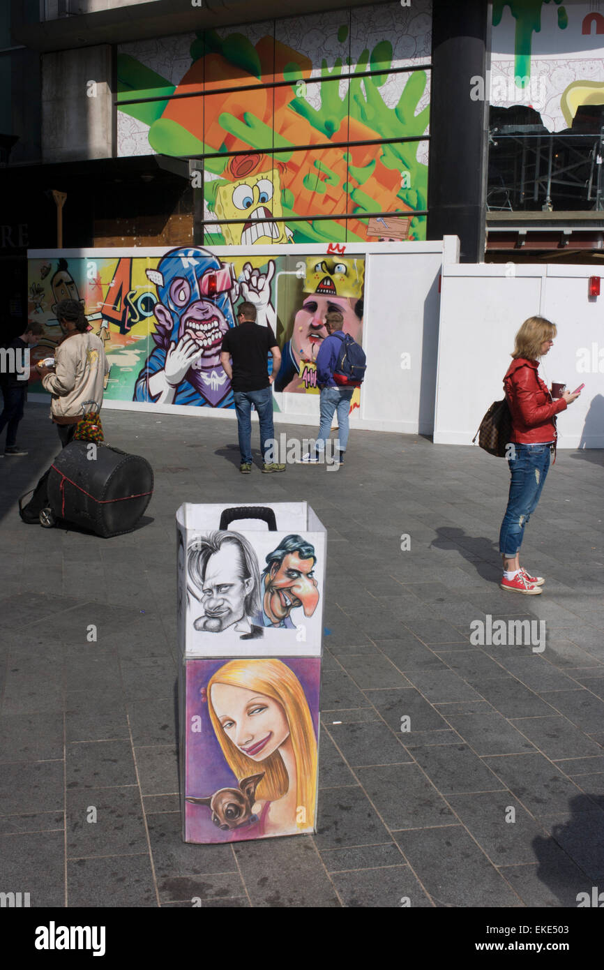 Street portrait caricatures and construction artwork faces in Leicester ...