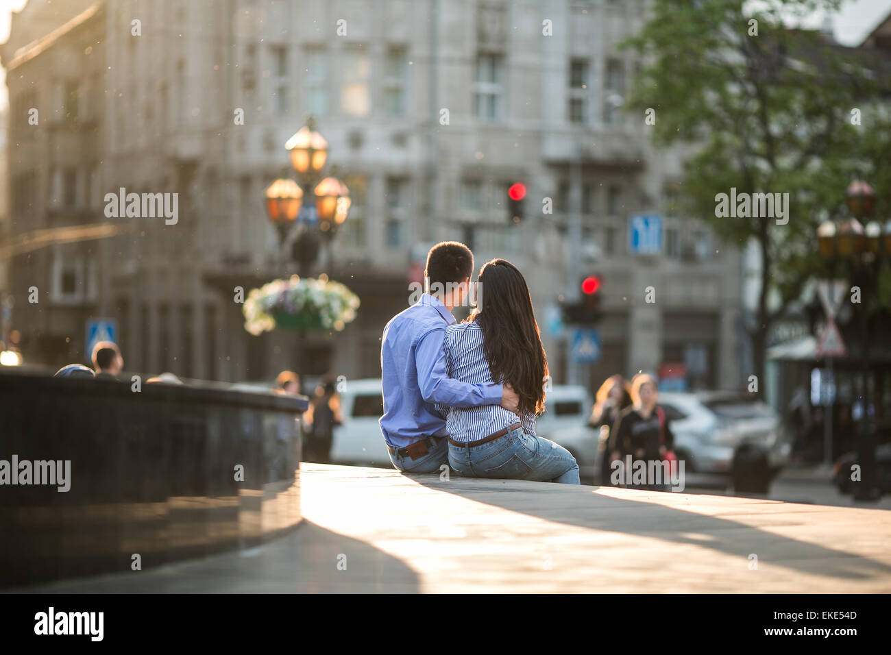 beautiful couple walking on the evening city Stock Photo - Alamy