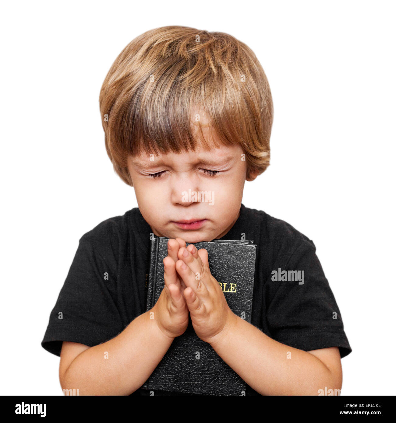 Little boy praying Stock Photo - Alamy