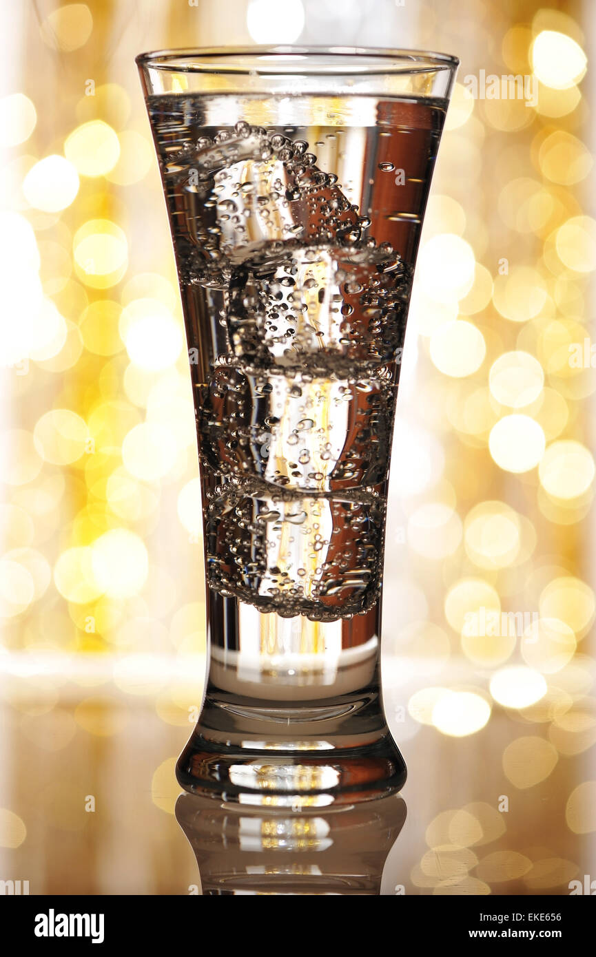 Glass with ice Stock Photo - Alamy