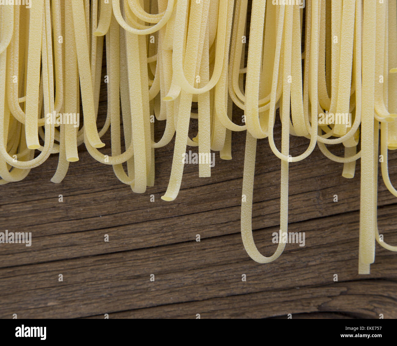Spaghetti pasta on wooden hi-res stock photography and images - Alamy