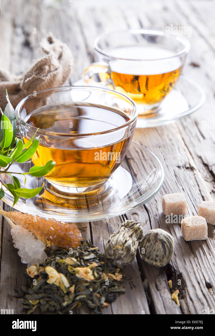 Transparent cup of green tea on wooden background Stock Photo - Alamy