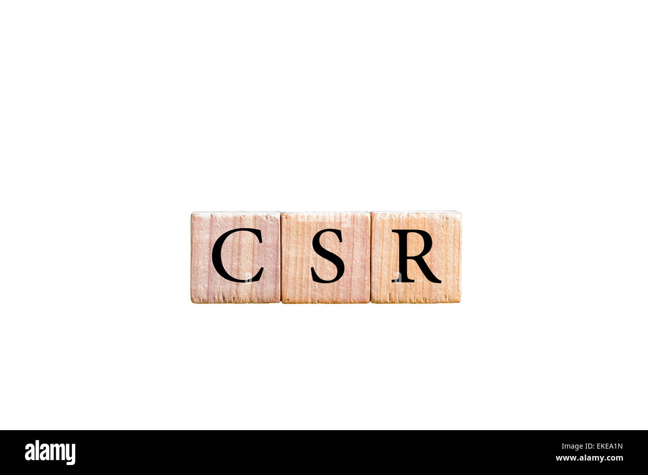 Acronym CSR- corporate social responsibility. Wooden small cubes with ...